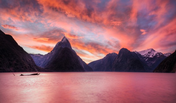 A pink sunset at Milford Sound New Zealand - Photorator